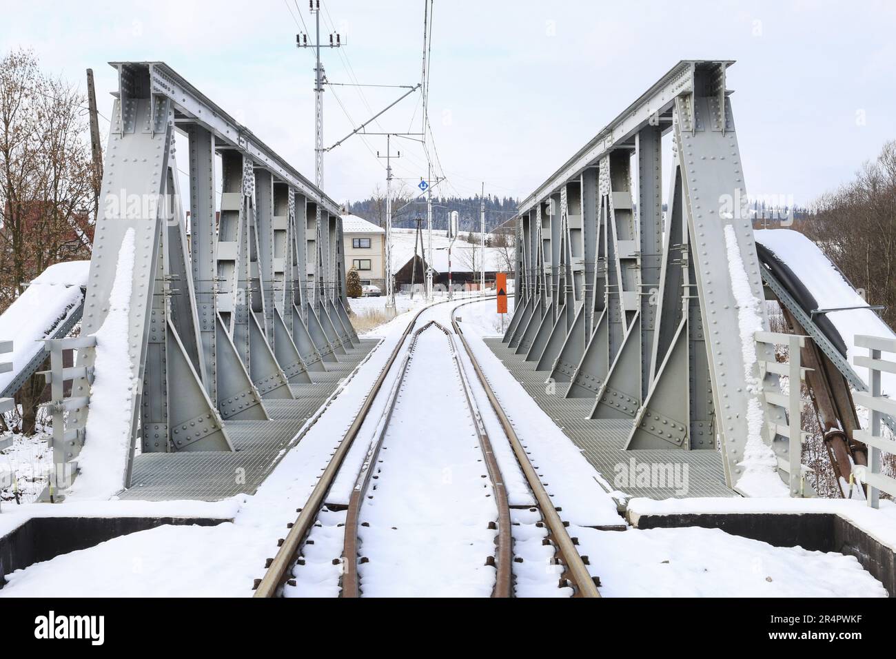 Iron railway bridge under the snow Stock Photo - Alamy