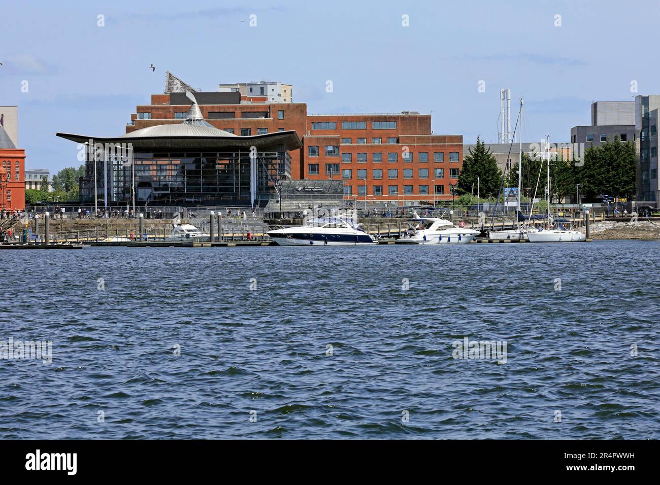 Cardiff Bay, Senedd Building with yachts. May 2023. Summer Stock Photo ...