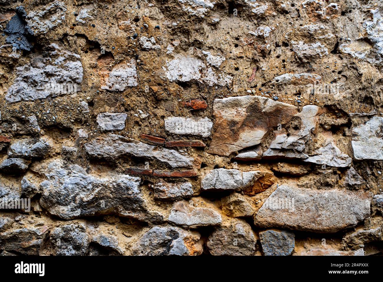 Background, pattern. Rustic natural stones wall with green moss and ...
