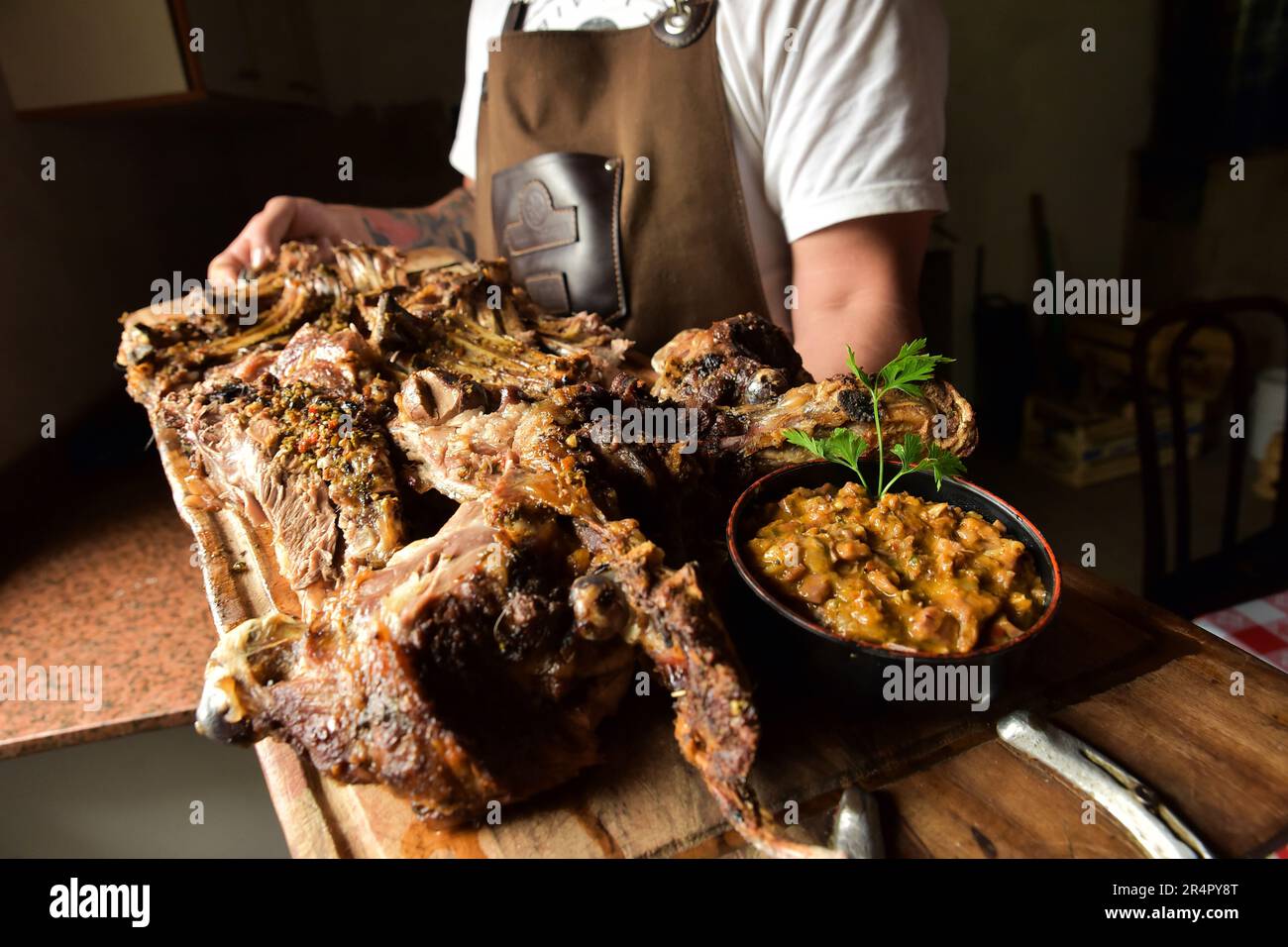 Lamb roasted to the stake (traditional Argentine food Stock Photo - Alamy