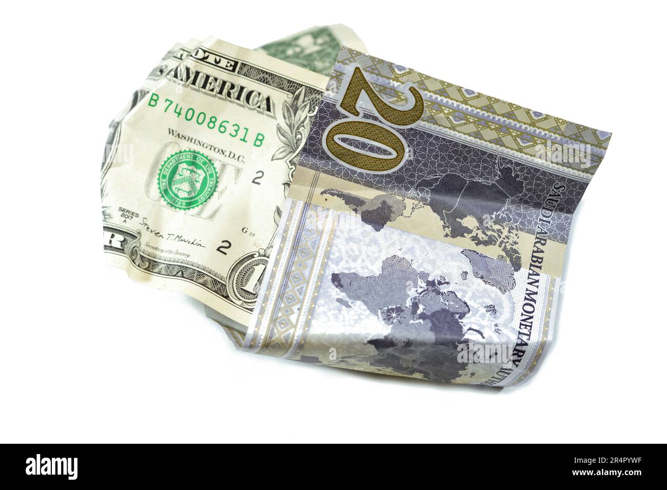 Wrinkled and crumpled Saudi Arabia money of 20 SAR twenty riyals and 1 ...