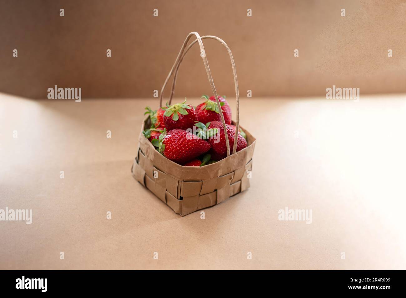 basket paper craft from recycled waste paper bag Stock Photo - Alamy