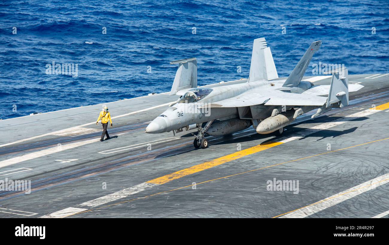 230528-N-NX635-1063 PACIFIC OCEAN (May 28, 2023) A U.S. Navy Sailor observes an F/A-18E Super ...