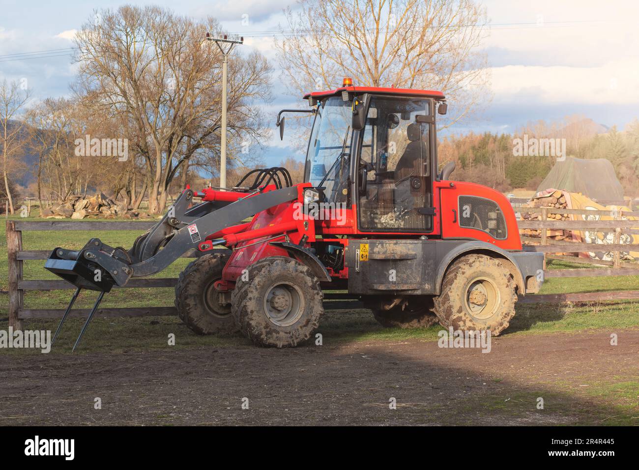 Red tractor on animal farm.High quality photo Stock Photo - Alamy