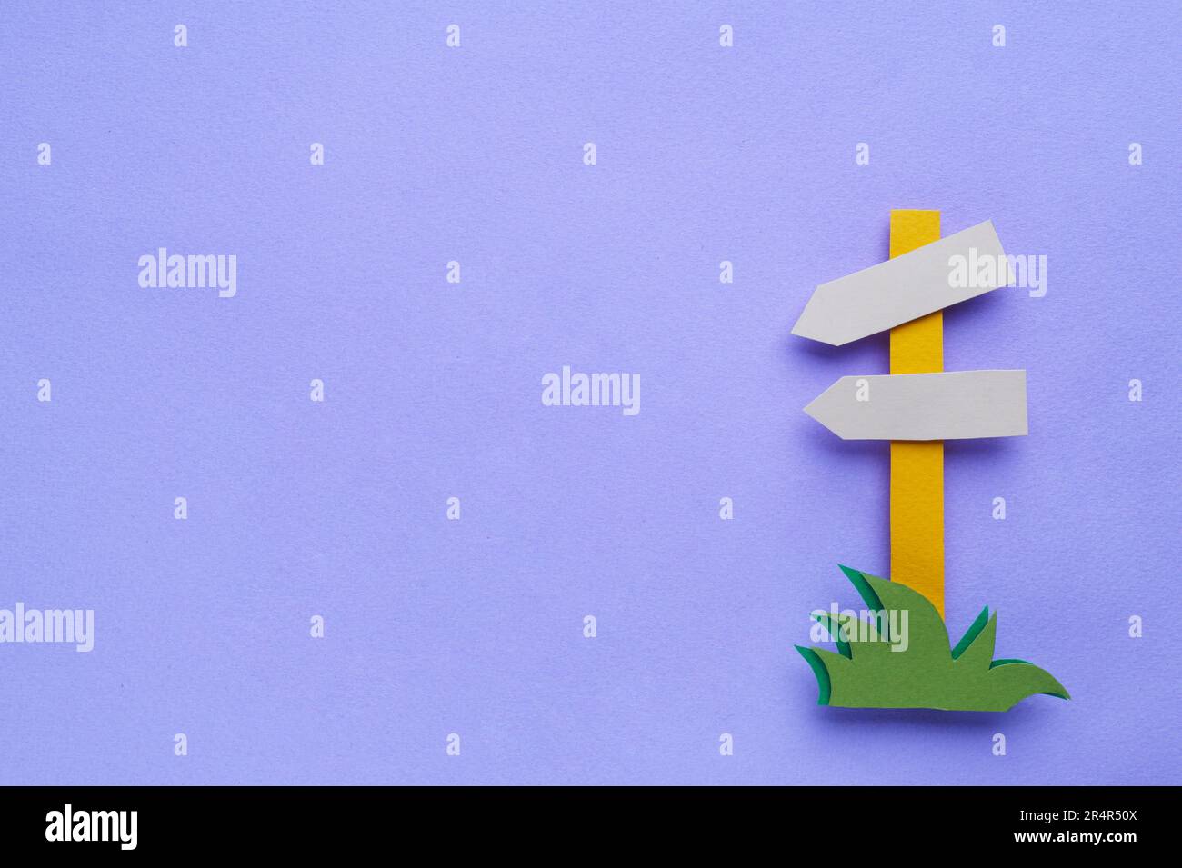 Paper signpost on purple background, top view. Space for text Stock ...