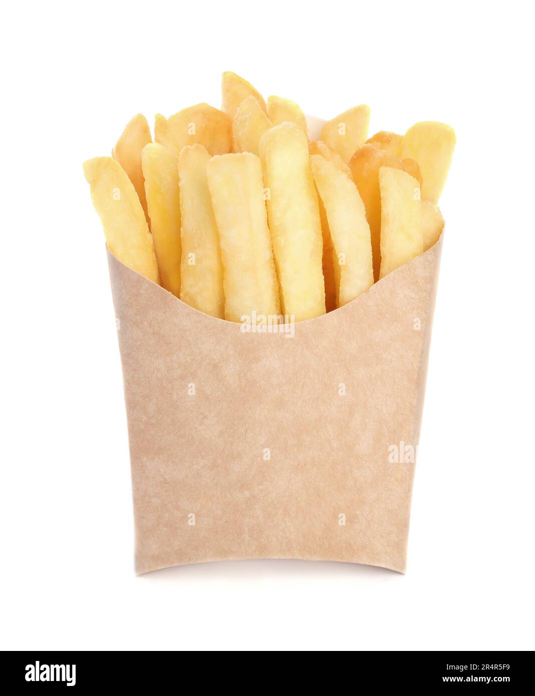 Paper takeout container with delicious french fries on white background ...