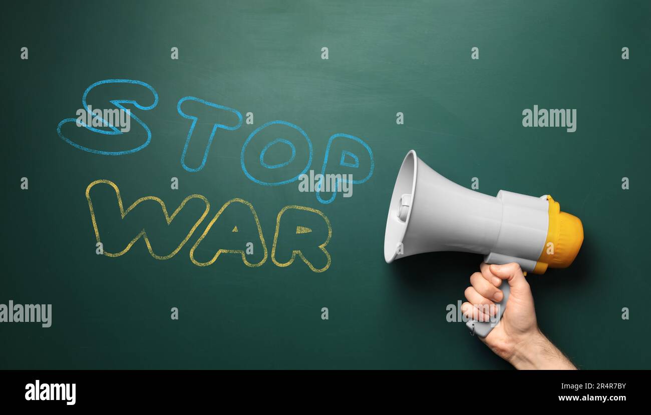 Man calling for Stop War using megaphone, closeup. Words in colors of ...