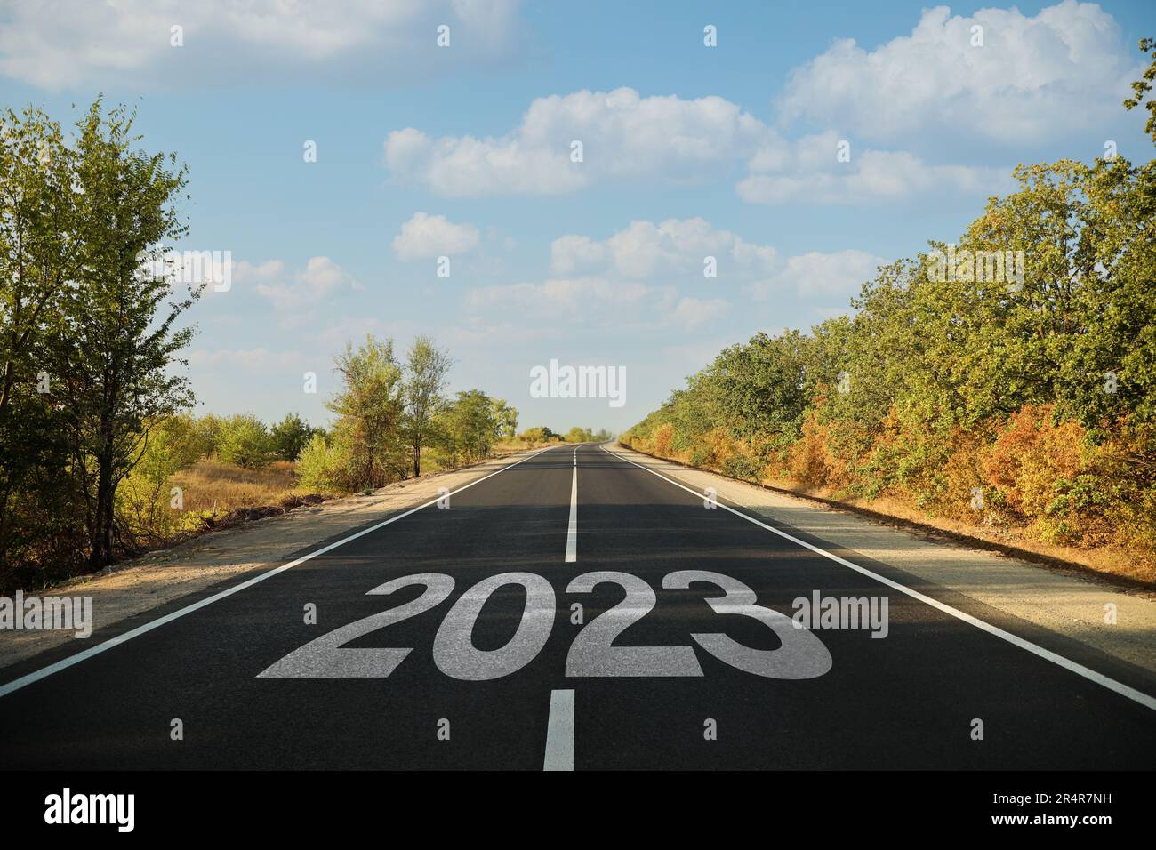 Start of new 2023 year. Asphalt road with numbers on sunny day Stock ...