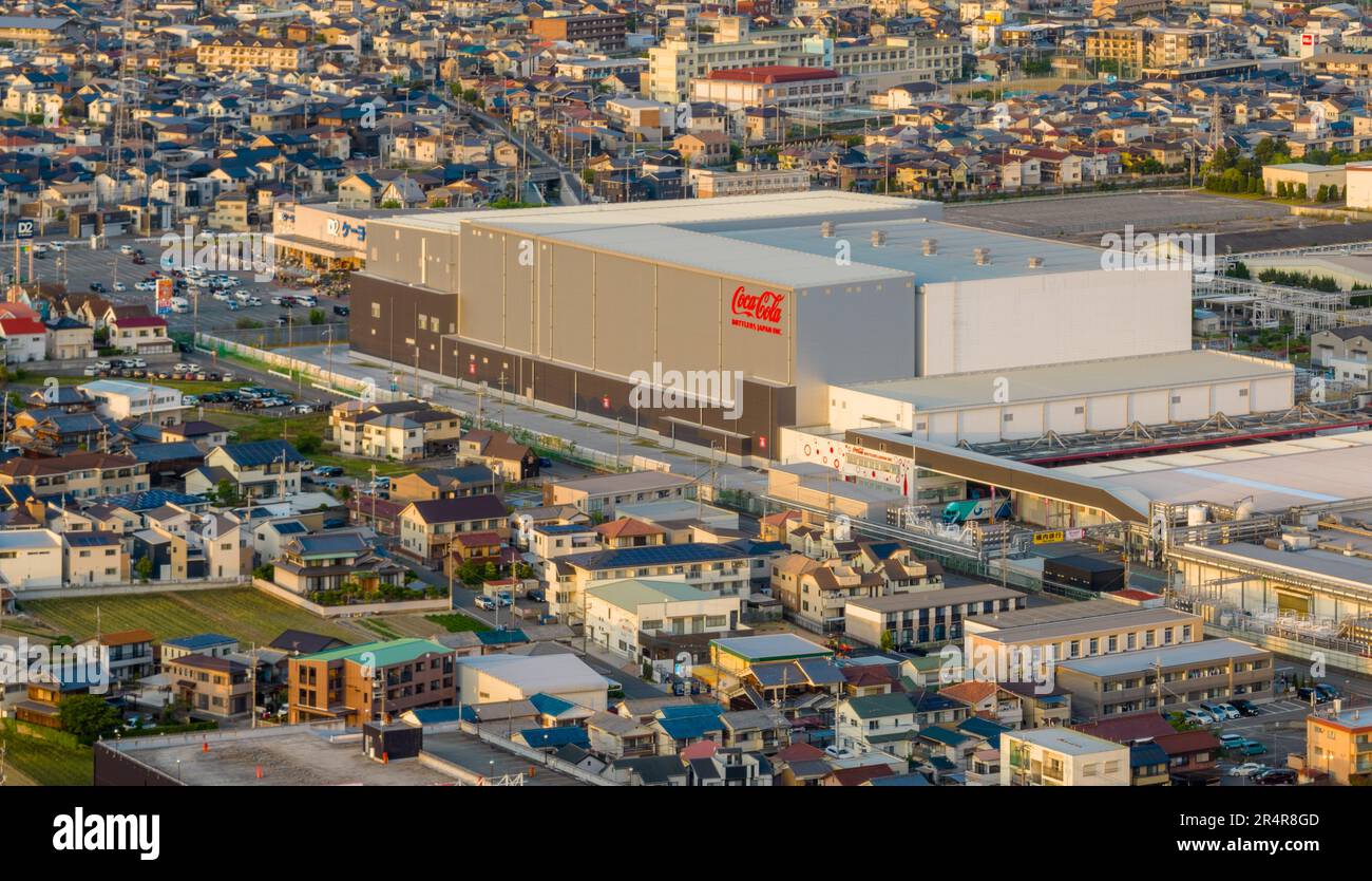 Okubo, Japan - May 20, 2023: Coca Cola bottling plant by houses in ...