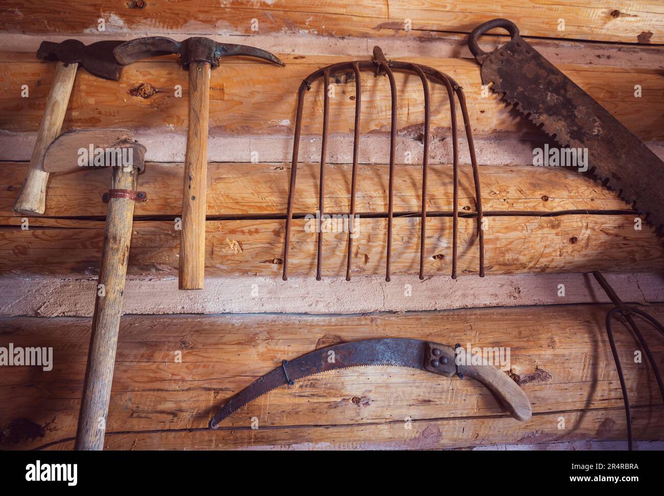 Tools in old workshop interior Stock Photo - Alamy