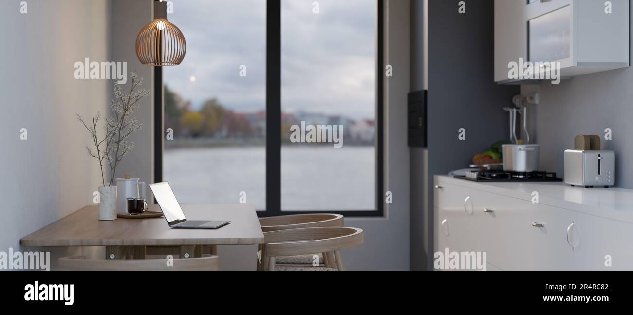 Interior design of a modern and minimal apartment kitchen with laptop ...