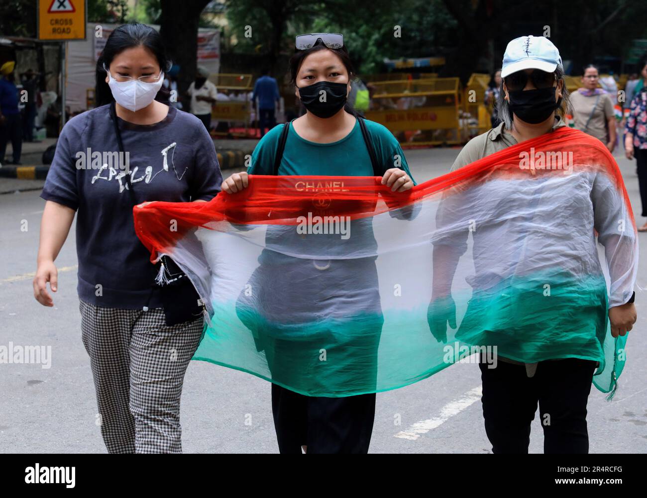 Women belonging to Manipur 'Kuki tribe' march through the street while ...