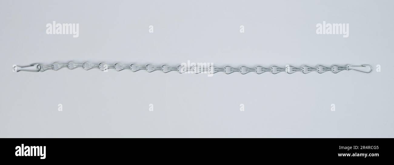Metal steel linked chain with hooks isolated on white studio background ...
