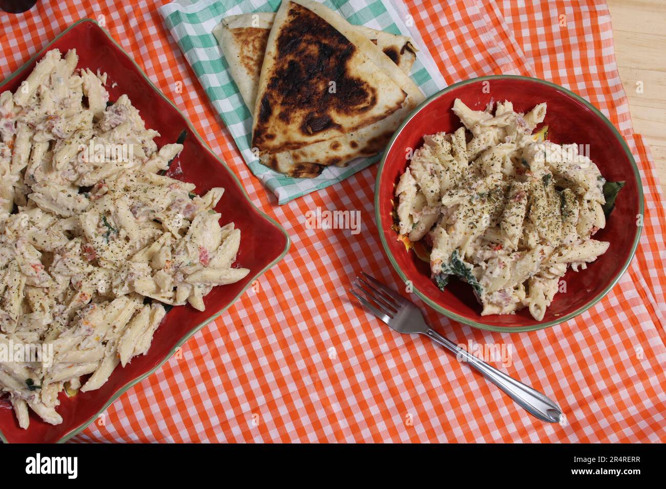 Pasta Carbonara With Italian Flat Bread on Rustic Buffet Table Stock ...