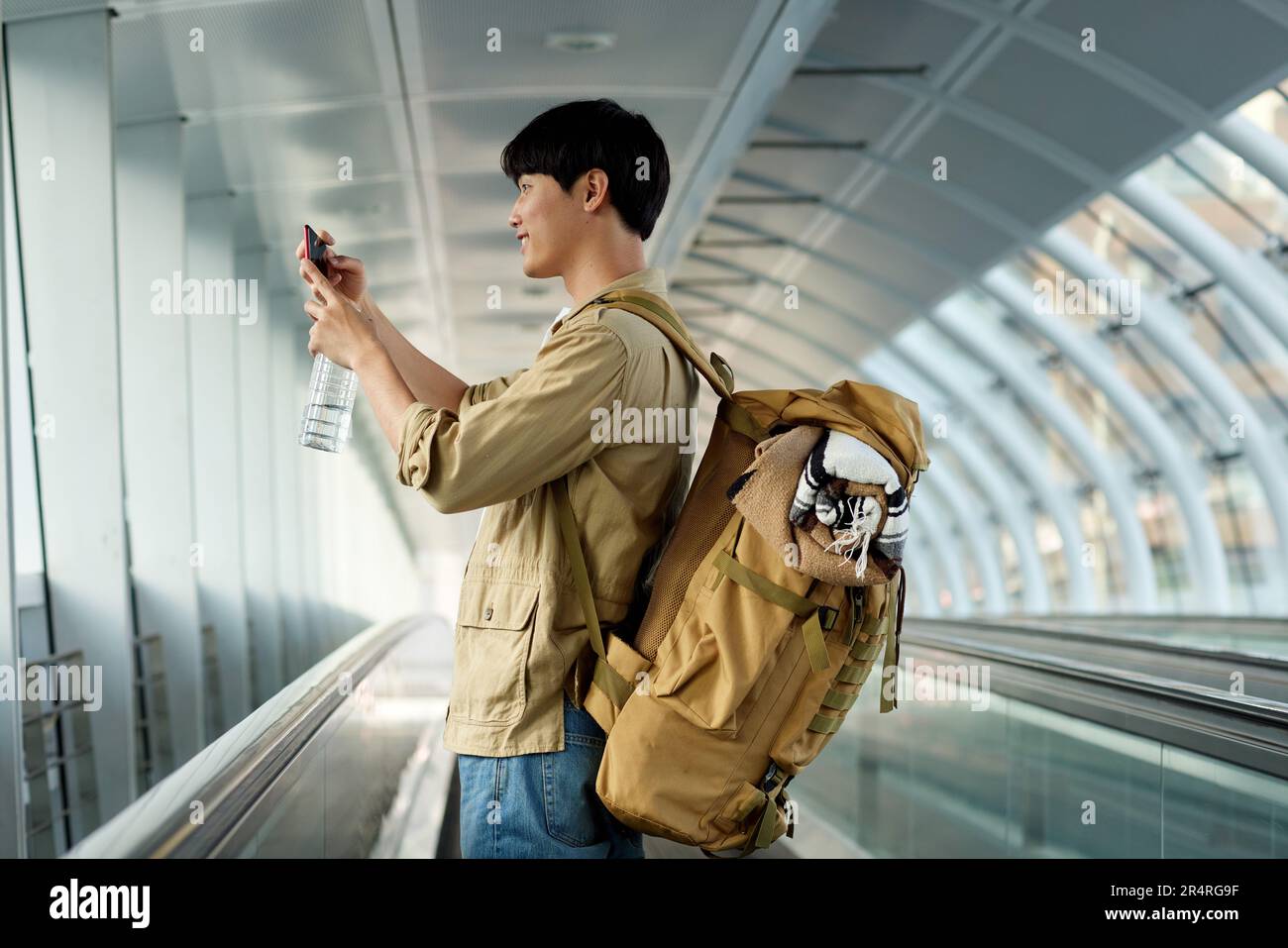 Young Japanese man travelling Stock Photo - Alamy