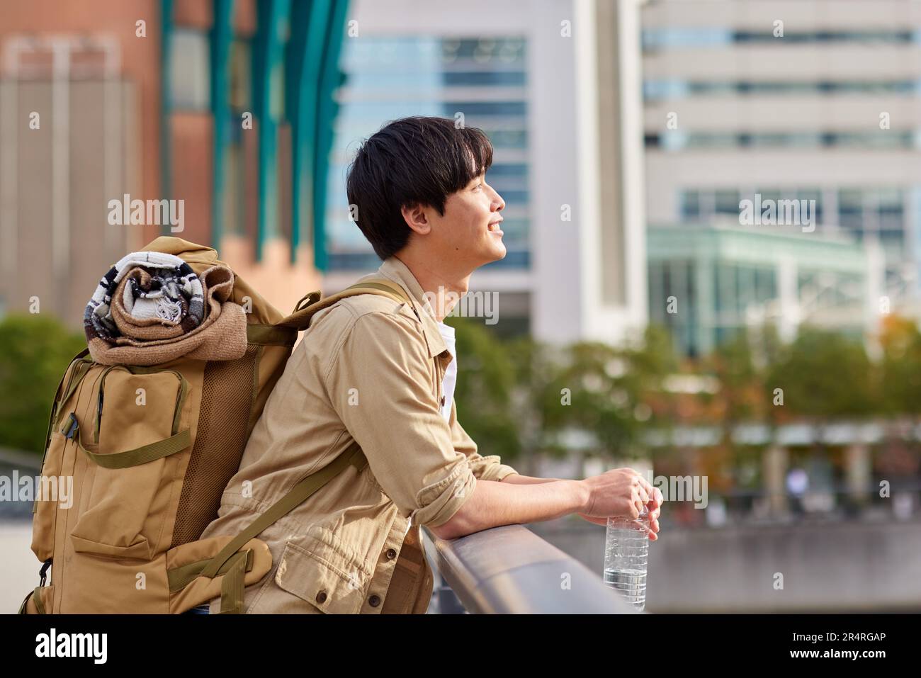 Young Japanese man travelling Stock Photo - Alamy