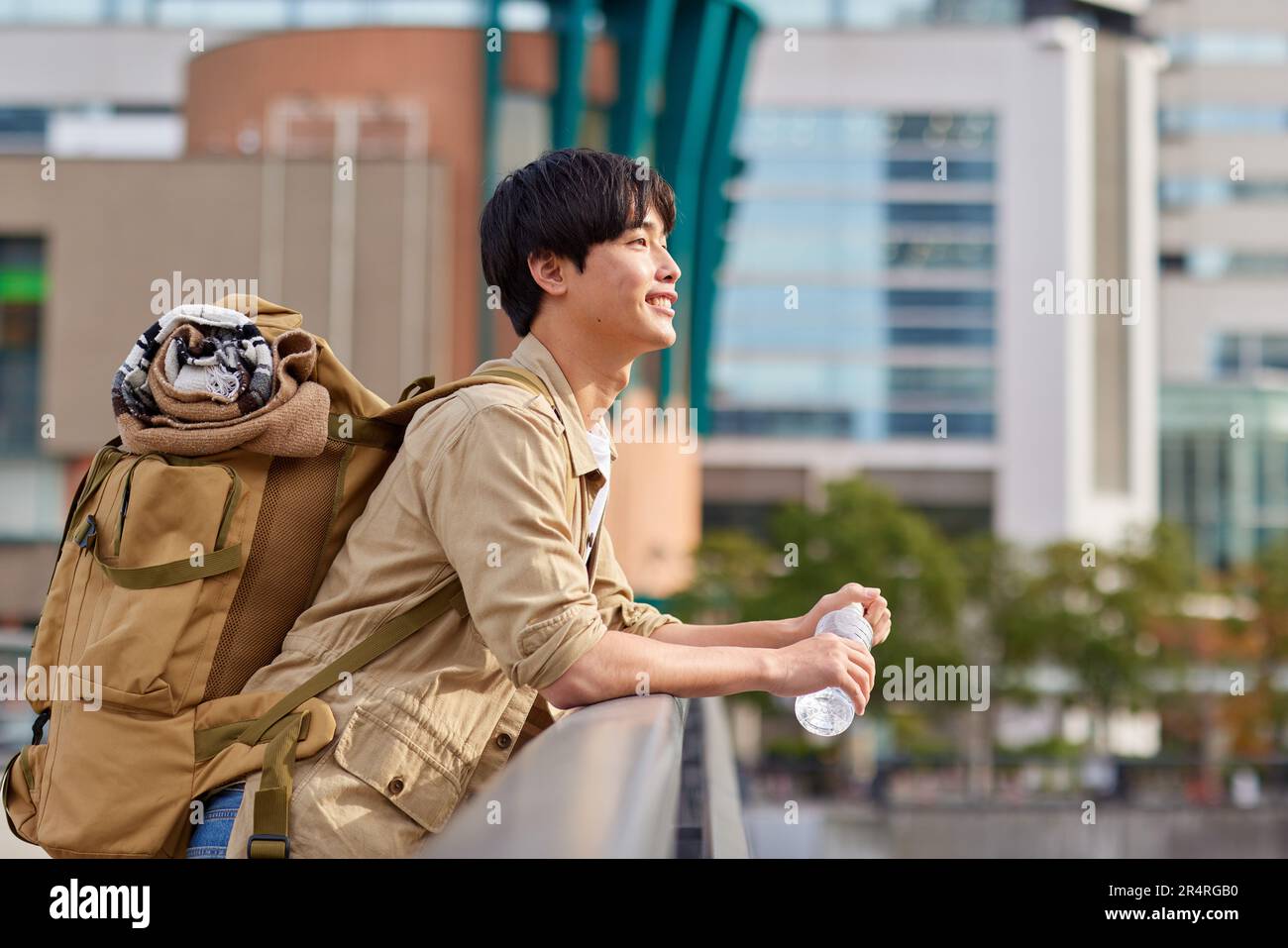 Young Japanese man travelling Stock Photo - Alamy