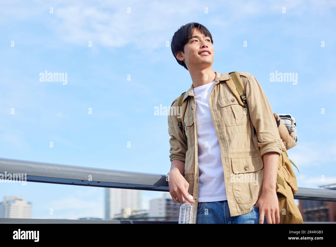 Young Japanese man travelling Stock Photo - Alamy