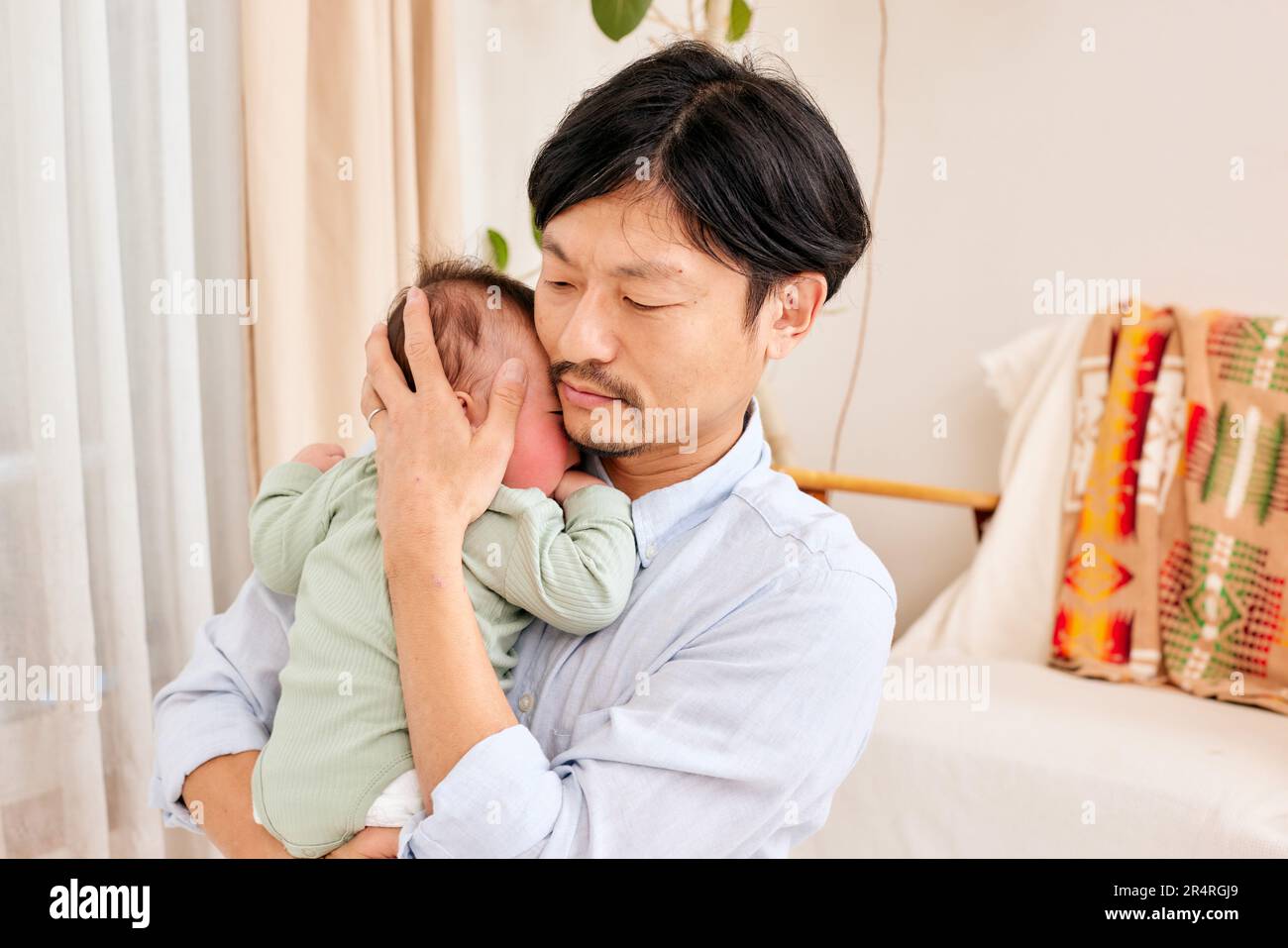 Japanese father and newborn Stock Photo - Alamy