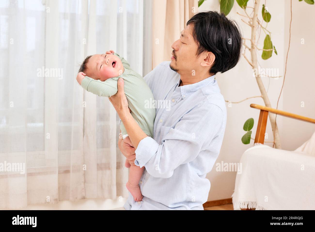 Japanese father and newborn Stock Photo - Alamy