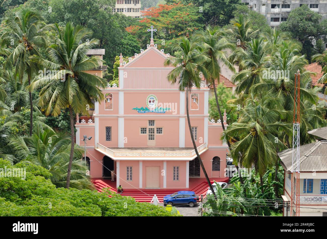 Our Lady of Dolours chapel surrounded by greenery of coconut palms at ...