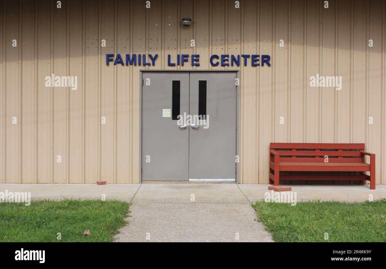 Metal Building With Family Life Center Sign above Doors Stock Photo - Alamy