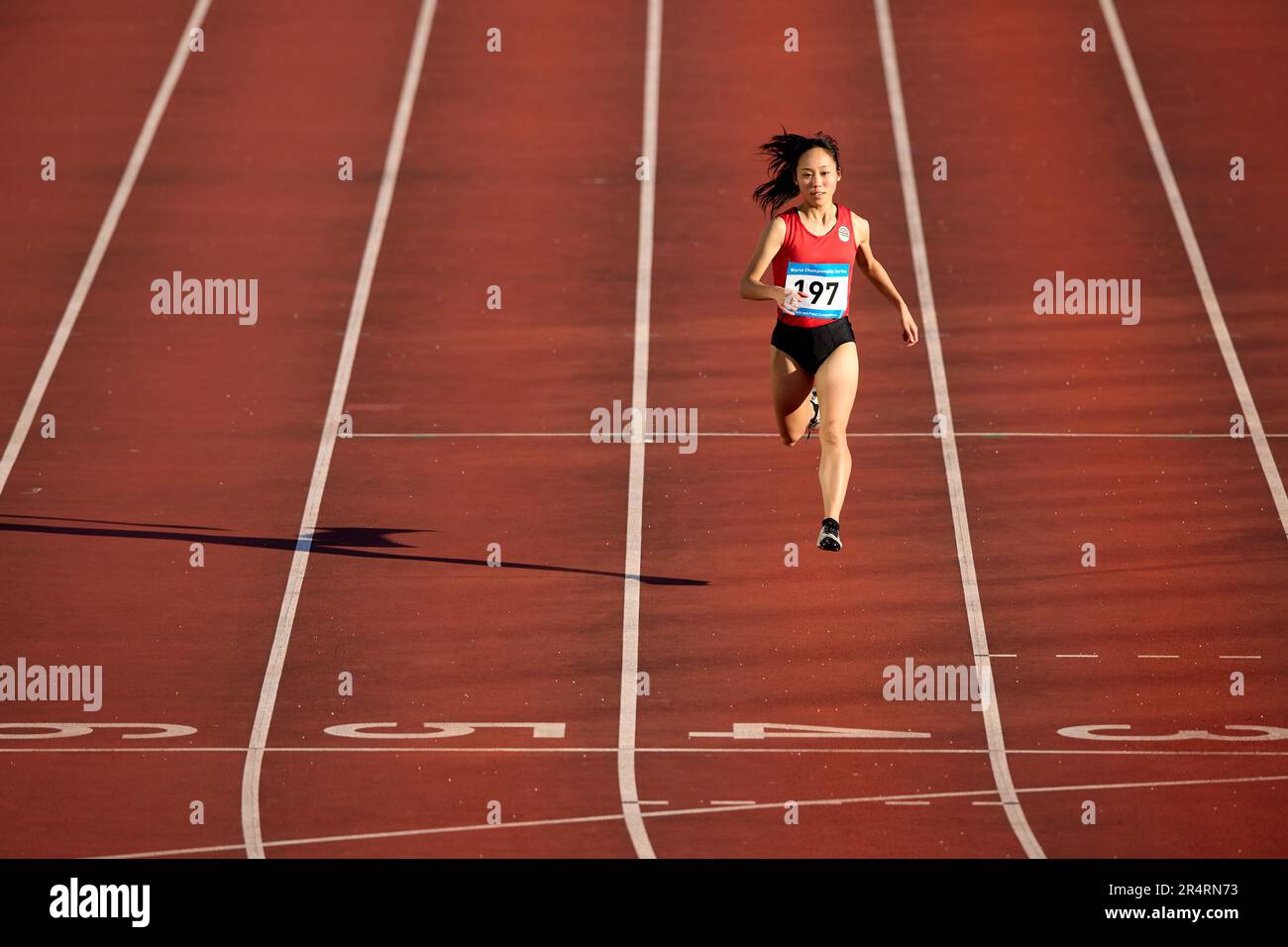 Japanese athletes running on track Stock Photo - Alamy