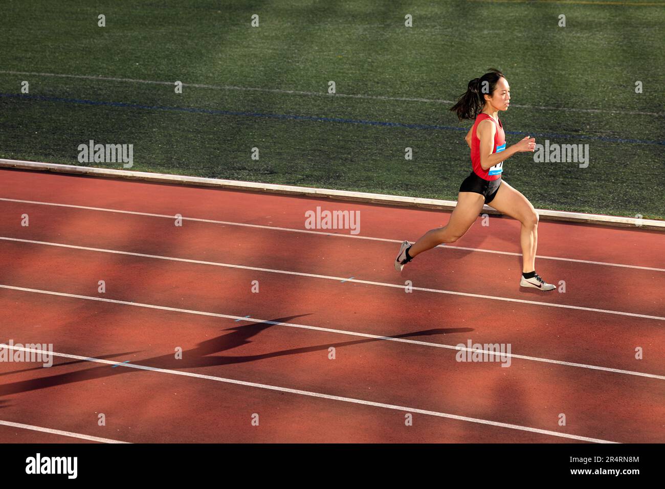 Japanese athletes running on track Stock Photo - Alamy