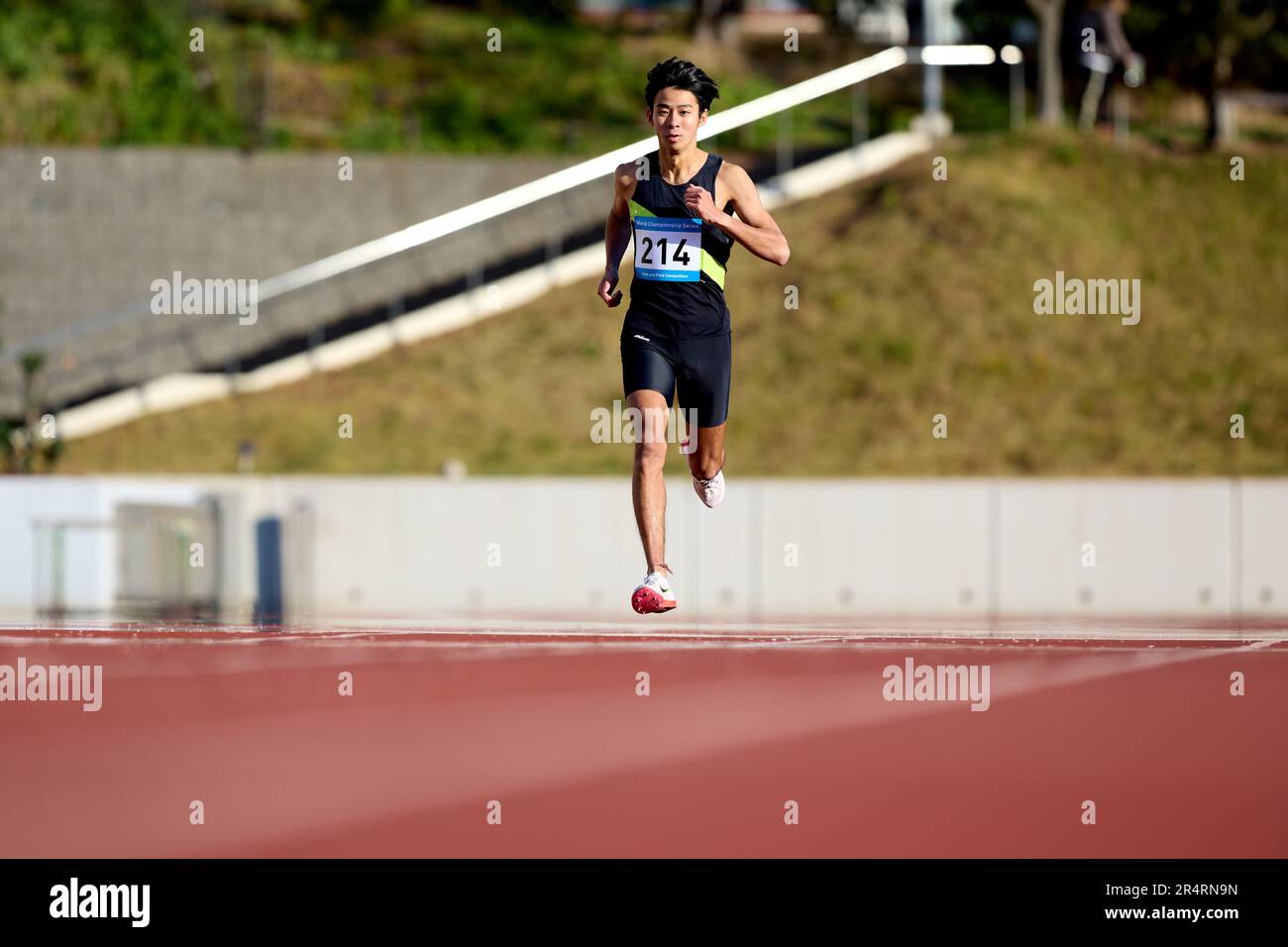 Japanese athletes running on track Stock Photo - Alamy