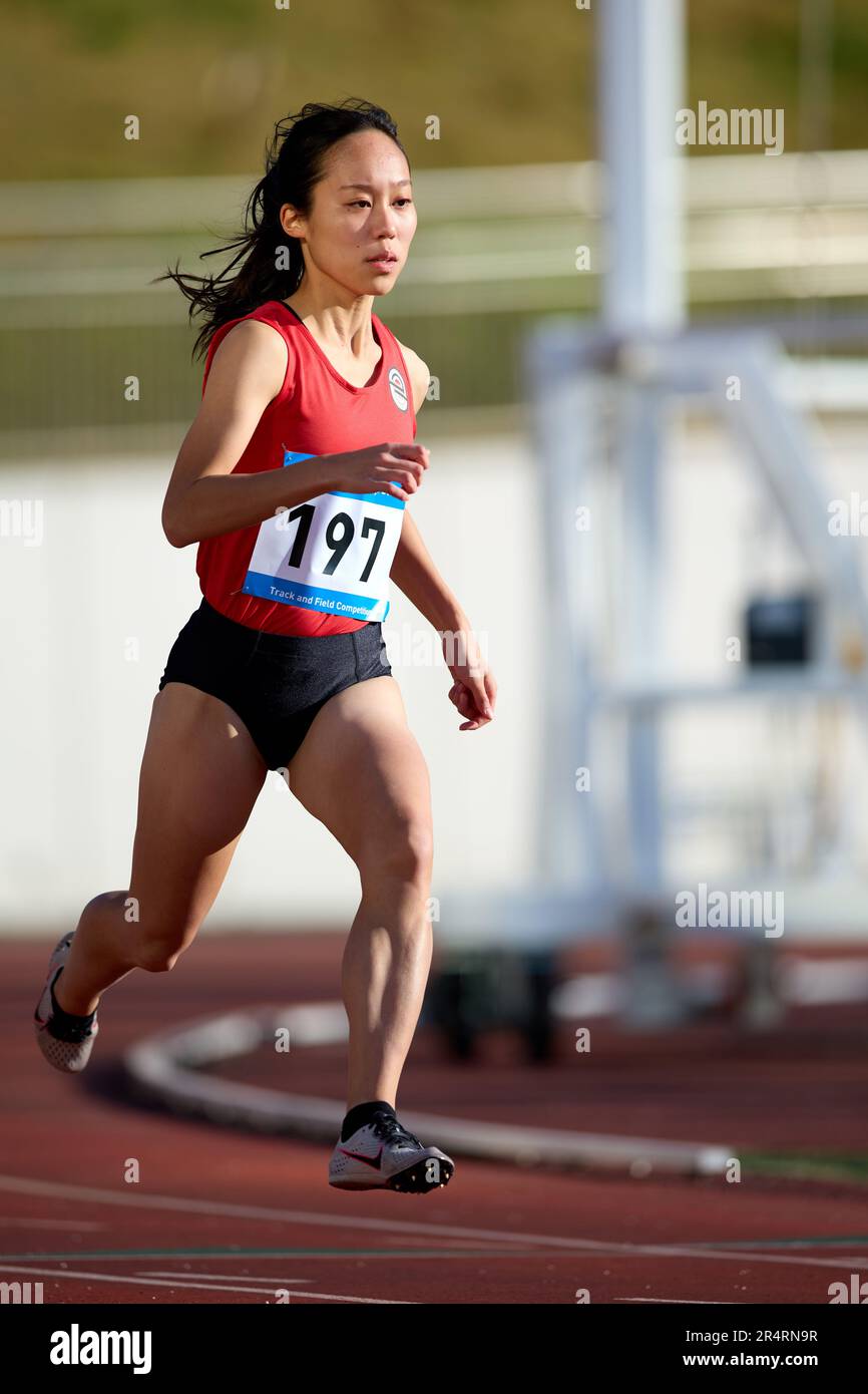 Japanese athletes running on track Stock Photo - Alamy