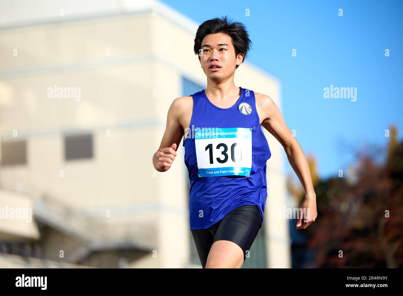Japanese athletes running on track Stock Photo - Alamy