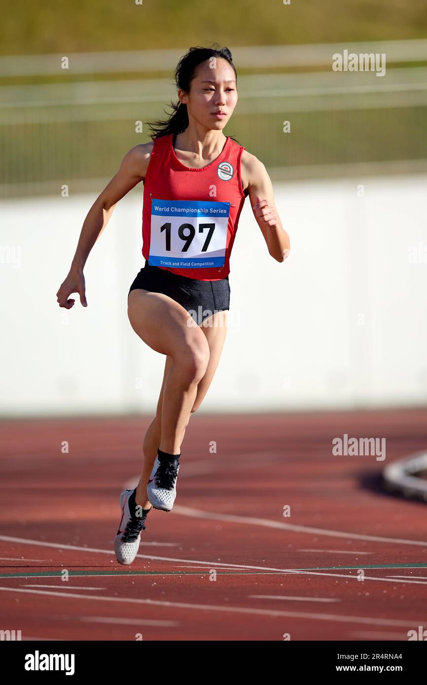 Japanese athletes running on track Stock Photo - Alamy