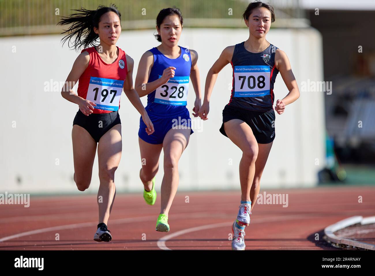 Japanese athletes running on track Stock Photo - Alamy