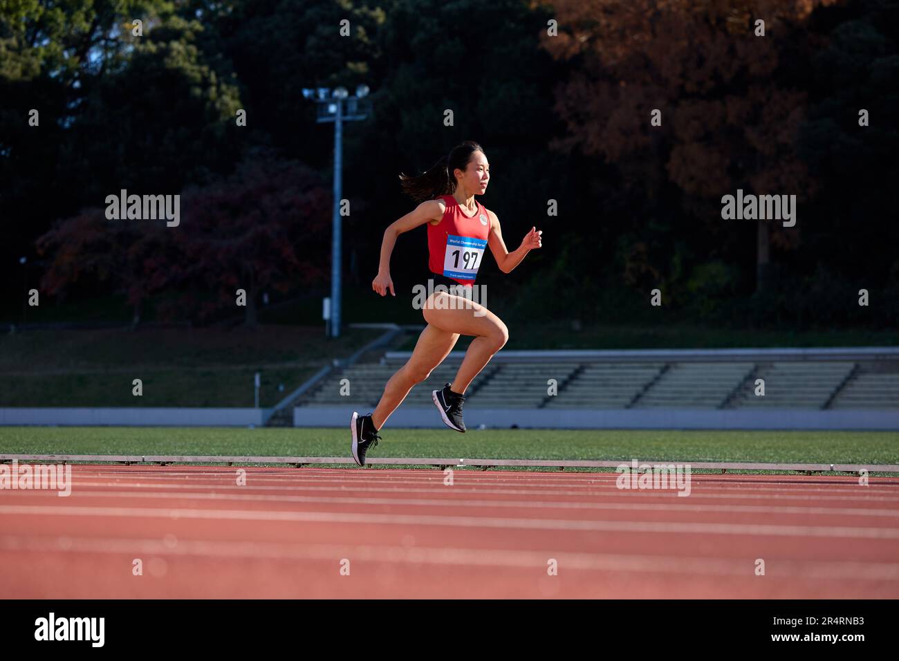Japanese athletes running on track Stock Photo - Alamy
