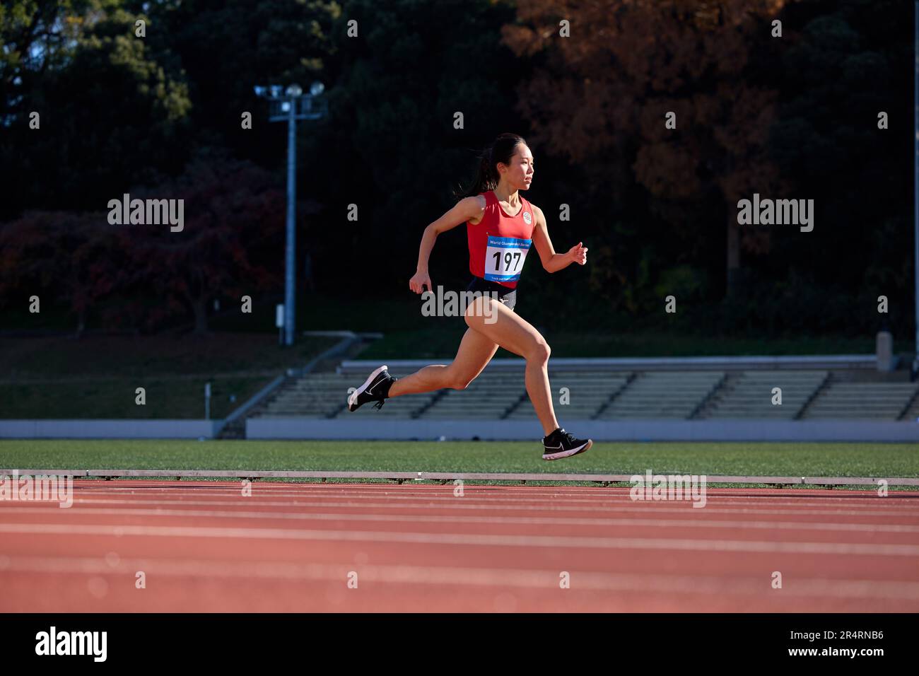 Japanese athletes running on track Stock Photo - Alamy