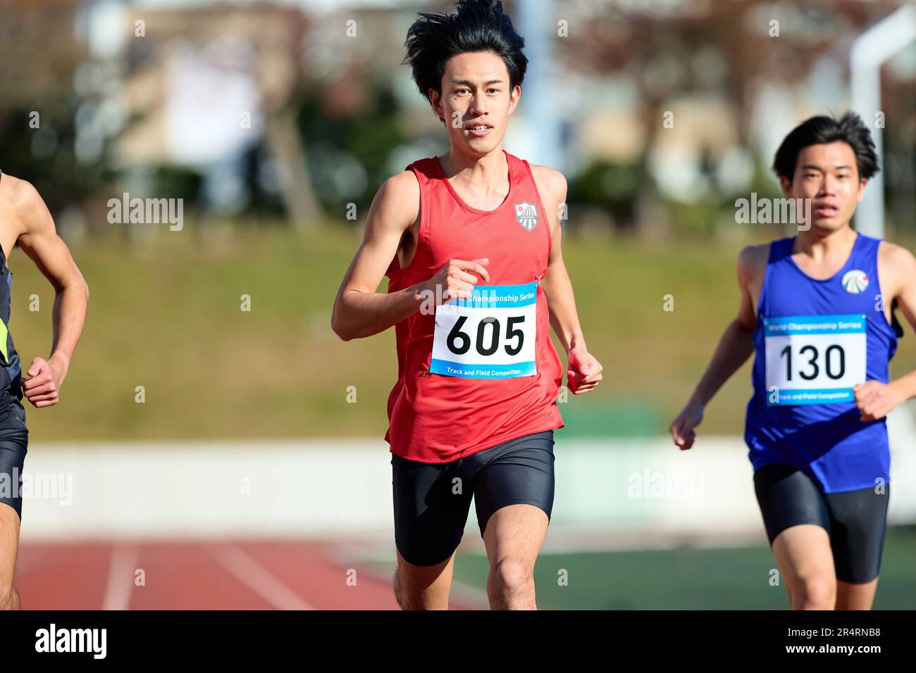 Japanese athletes running on track Stock Photo - Alamy