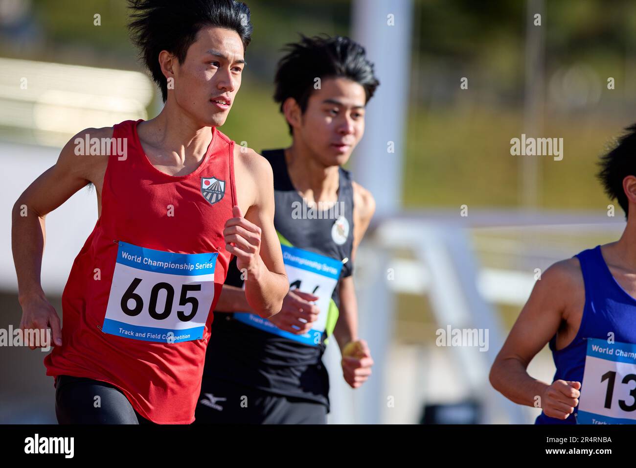 Japanese athletes running on track Stock Photo - Alamy