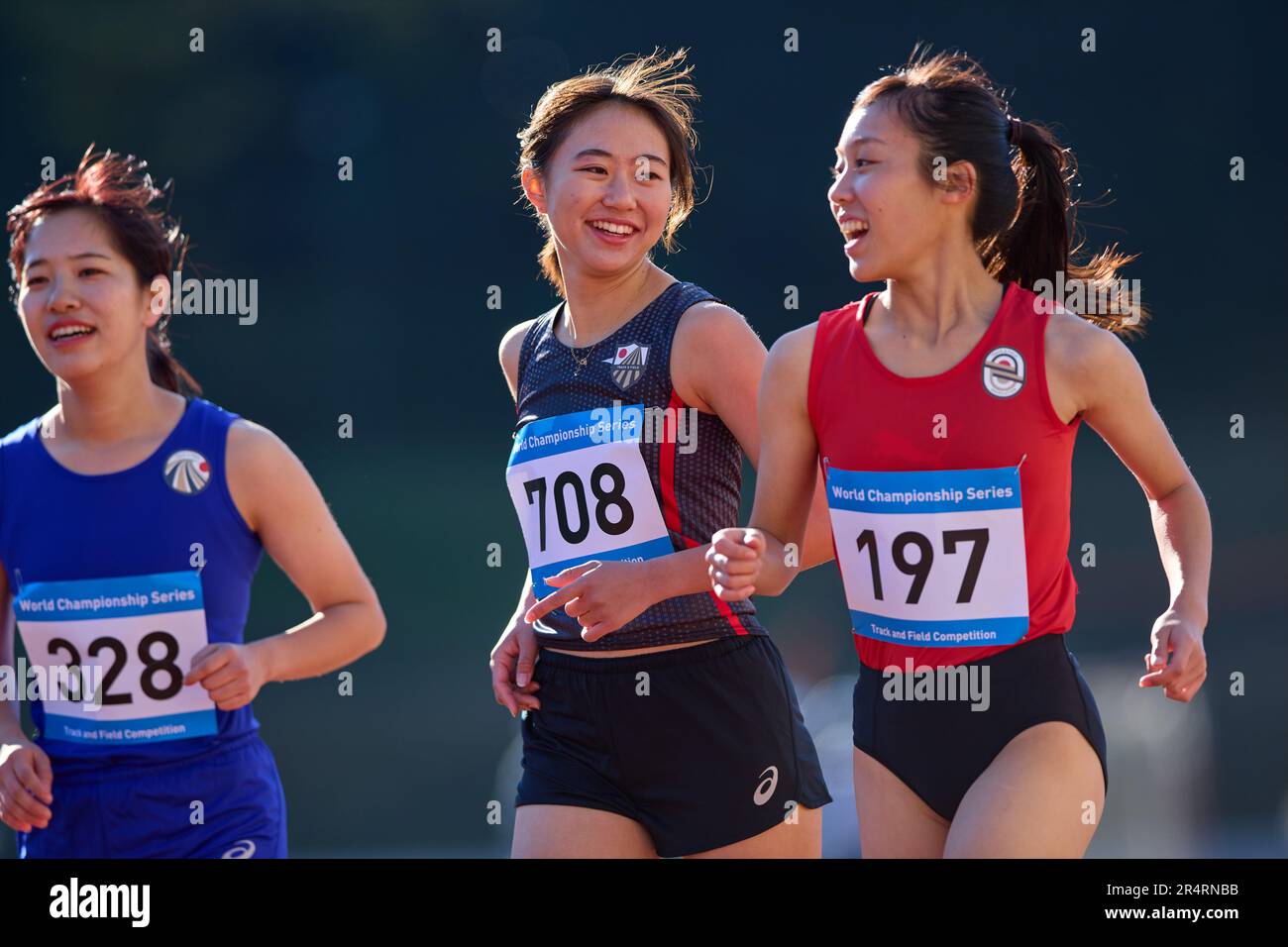 Japanese athletes running on track Stock Photo - Alamy