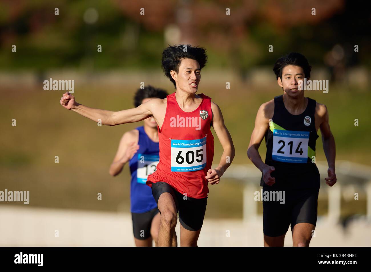 Japanese athletes running on track Stock Photo - Alamy