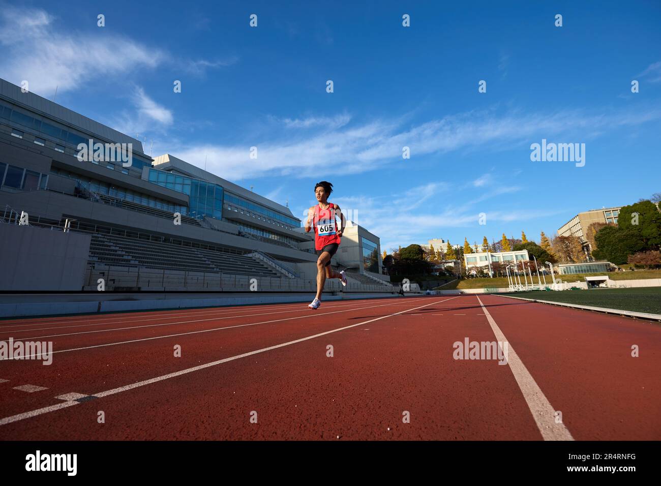 Japanese athletes running on track Stock Photo - Alamy