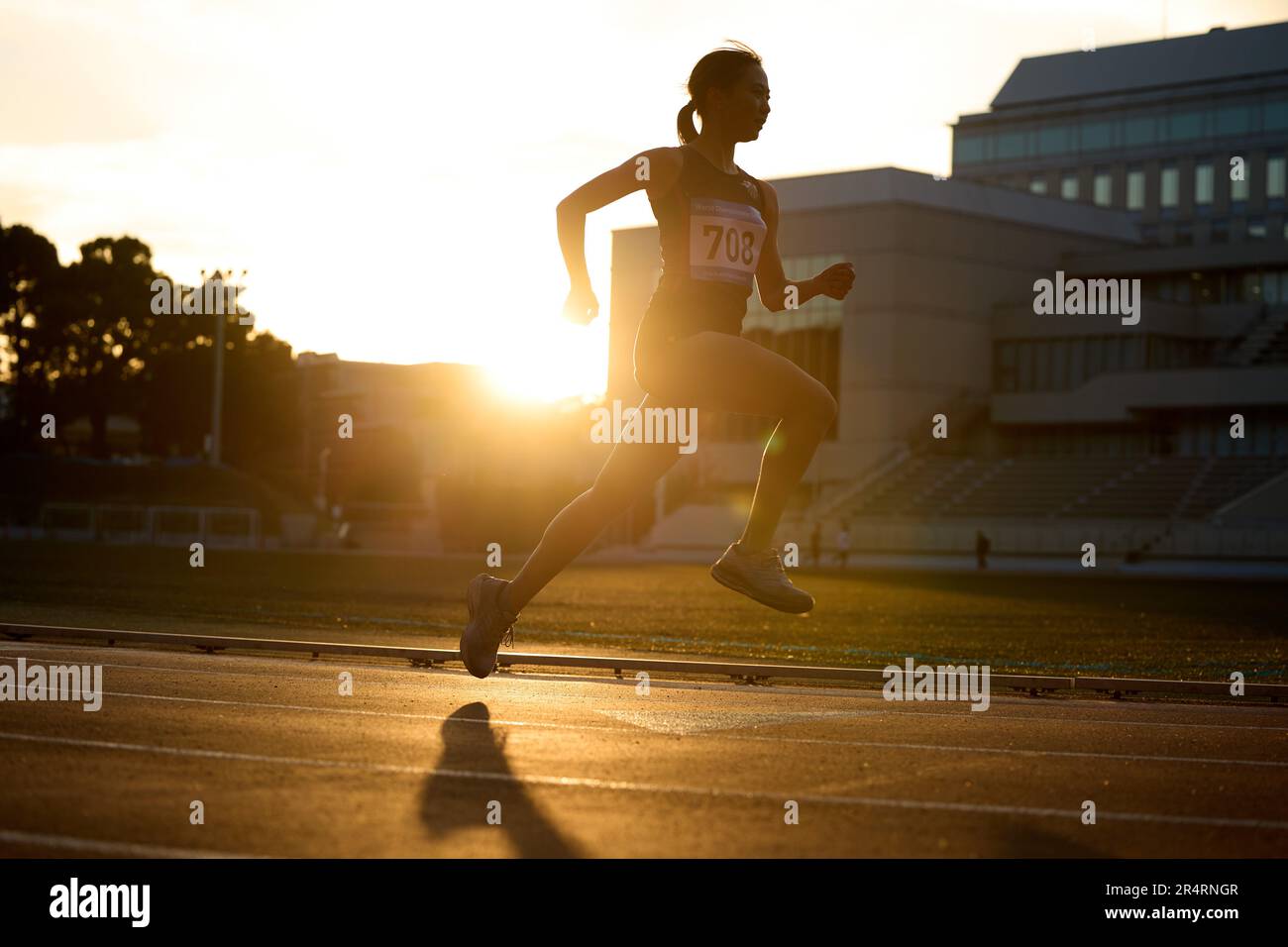 Japanese athletes running on track Stock Photo - Alamy