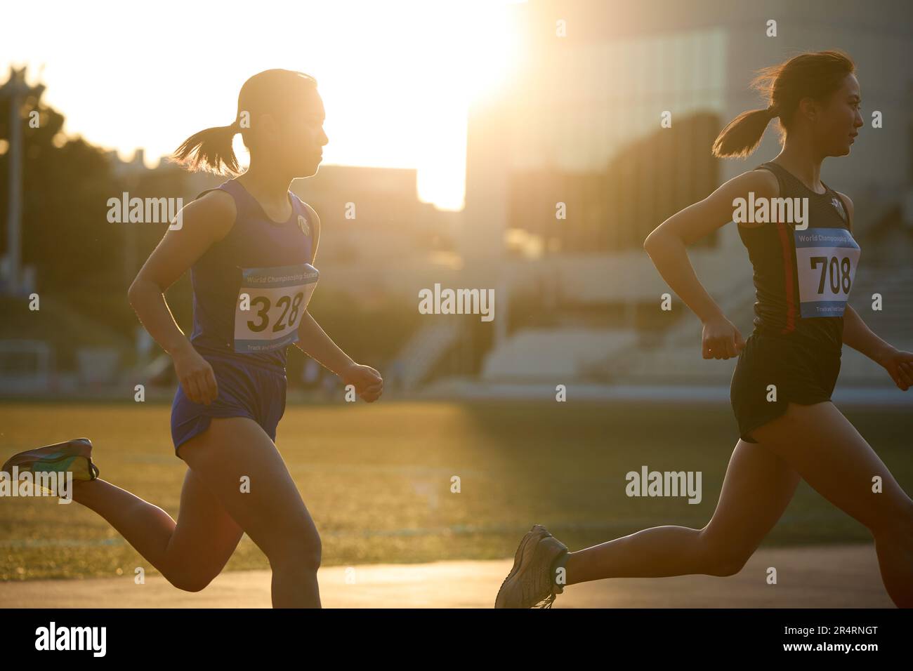 Japanese athletes running on track Stock Photo - Alamy