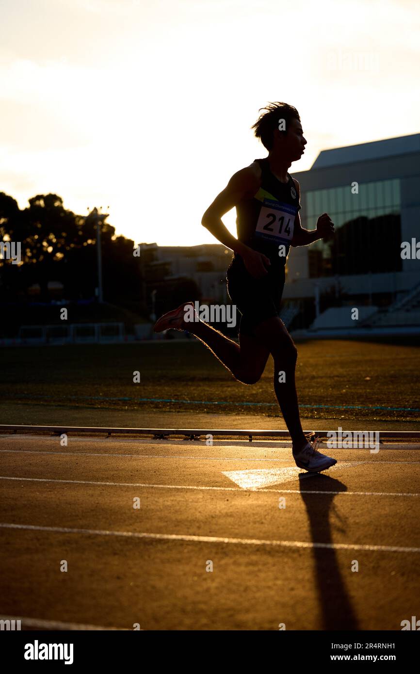 Japanese athletes running on track Stock Photo - Alamy