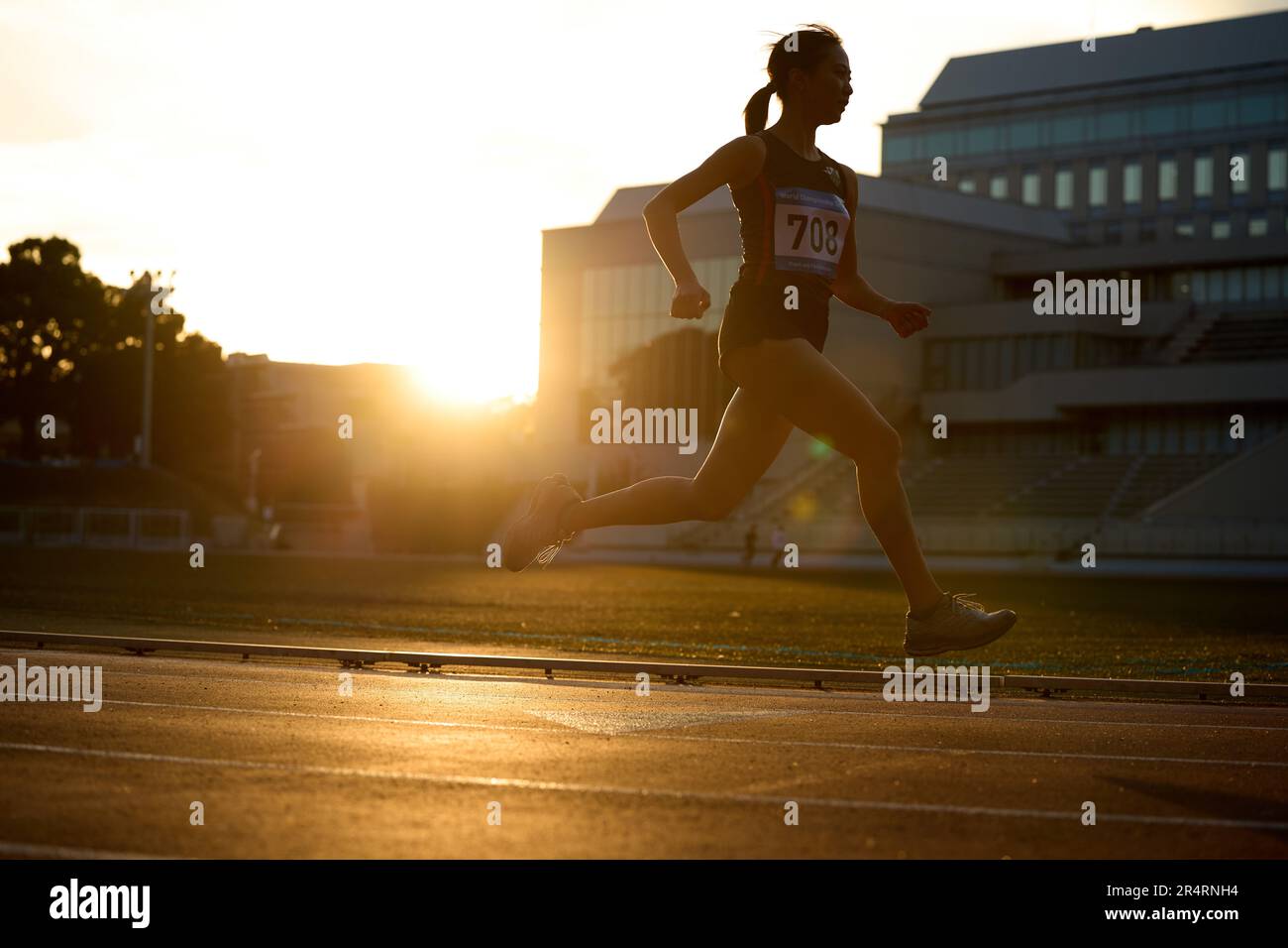 Japanese athletes running on track Stock Photo - Alamy
