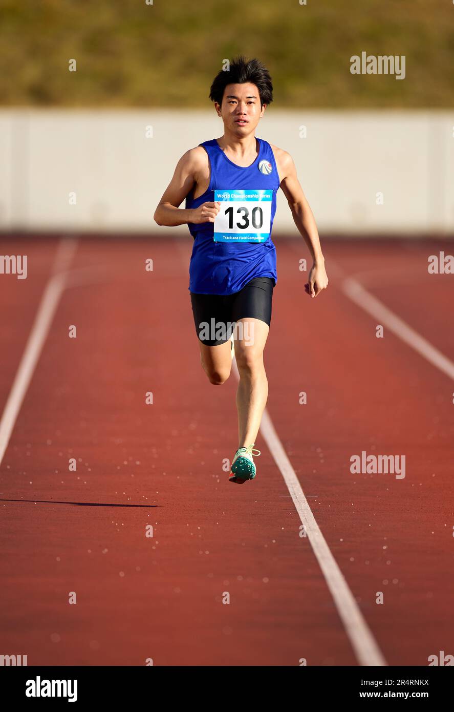 Japanese athletes running on track Stock Photo - Alamy