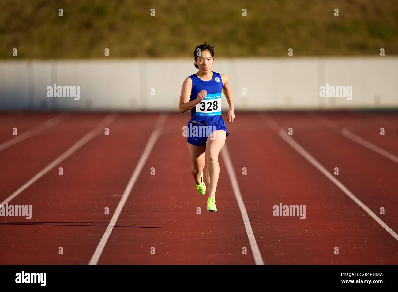 Japanese athletes running on track Stock Photo - Alamy