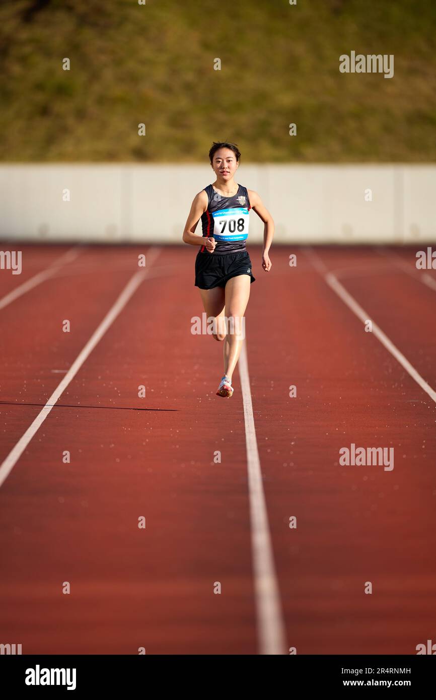 Japanese athletes running on track Stock Photo - Alamy