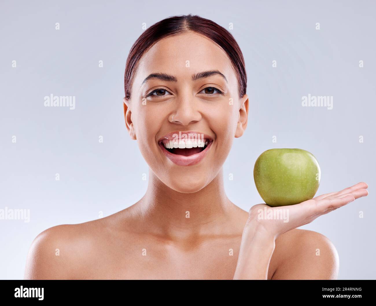 Apple, portrait or happy woman in studio eating on white background for ...