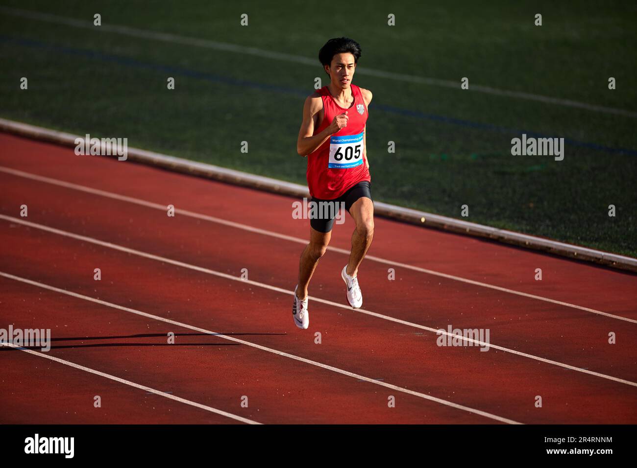 Japanese athletes running on track Stock Photo - Alamy