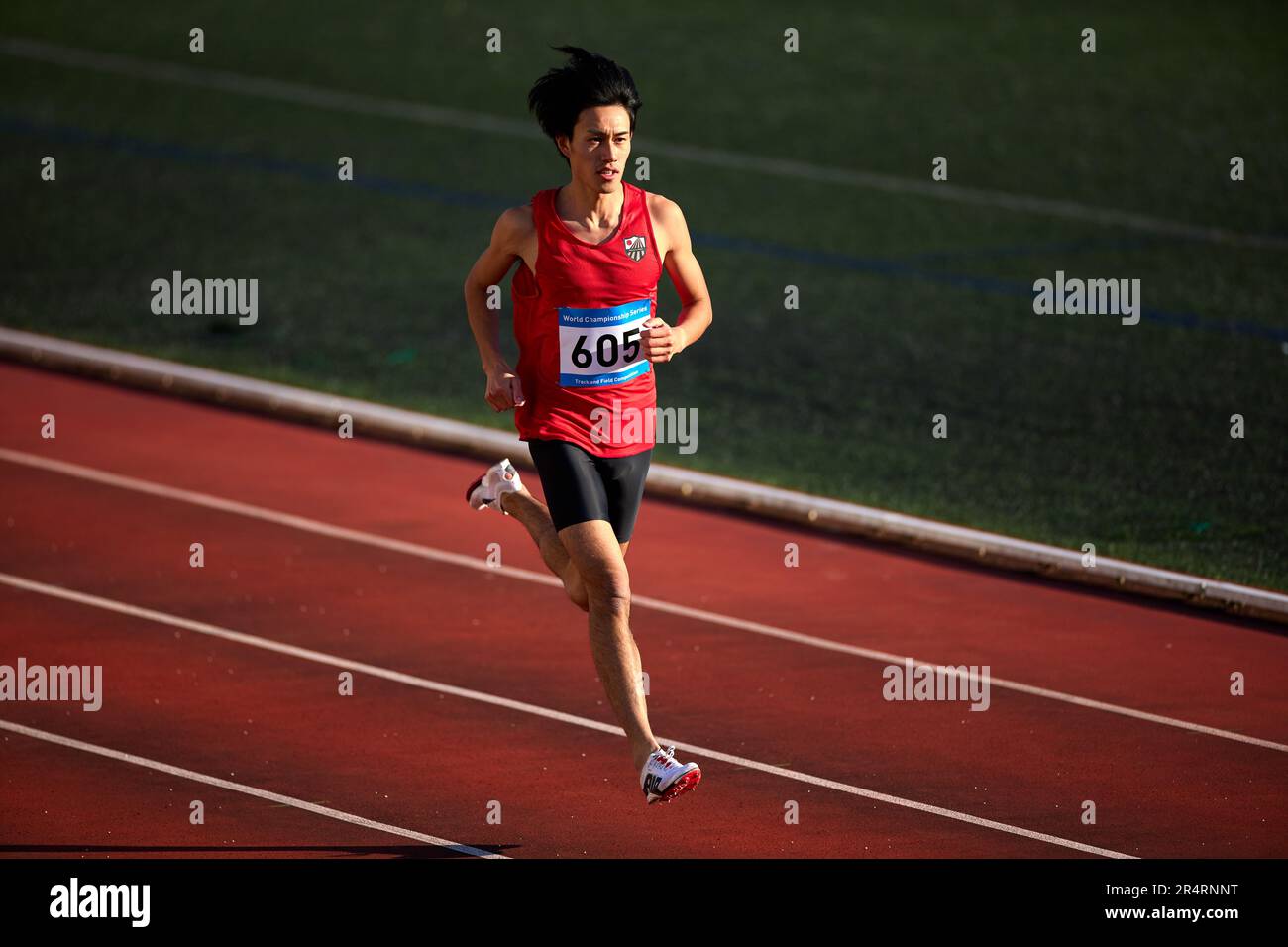 Japanese athletes running on track Stock Photo - Alamy